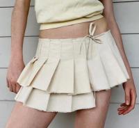 China Small Quantity Garment Manufacturer Irregular Denim Pleated Skirt For Women With Belt for sale