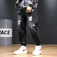 China Customized Logo Polyester Haren Nine Point Pants Loose Dark Blue Jeans for sale