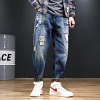 China Customized Logo Polyester Haren Nine Point Pants Loose Dark Blue Jeans for sale