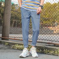 China Spring Summer Harem Men Denim Pants Drawstring Waist Jeans With Large Pockets for sale