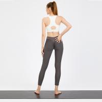 China Yoga Clothes 50%  Spandex 50% Nylon Blended Ladies Workout Fit Pants And Tops for sale