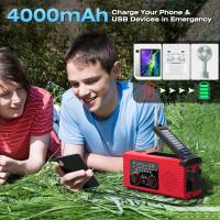 China Emergency Weather Radio 4000mAh NOAA Weather Alert Solar Charging Hand Crank USB Rechargeable AM/FM LED Flashlight for sale