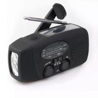 China Newest Portable Solar Panel Hand Crank Radio Dynamo Charger Emergency Weather Radio Flashlight 3 Band FM AM NOAA 2000mAh Battery for sale