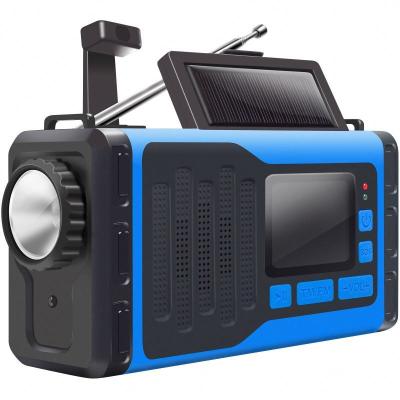 China High Quality Portable Power Bank with Solar Panel Plastic Phone Charr SOS AM/FM Radio Speaker USB Feature for sale