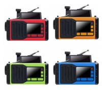 China High Quality Portable Power Bank with Solar Panel Plastic Phone Charr SOS AM/FM Radio Speaker USB Feature for sale