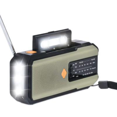 China Portable AM/FM Solar Dynamo Wind-Up Crank Radio with Flashlight Earphone Jack & SOS Alarm for Emergency Survival for sale