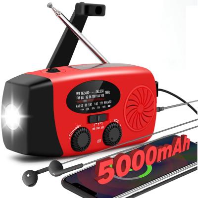 China Portable 5000mAh Red CE Certified Power Bank USB Charger Emergency Solar Hand Crank AM/FM Radio SOS Signal Flashlight Factory for sale