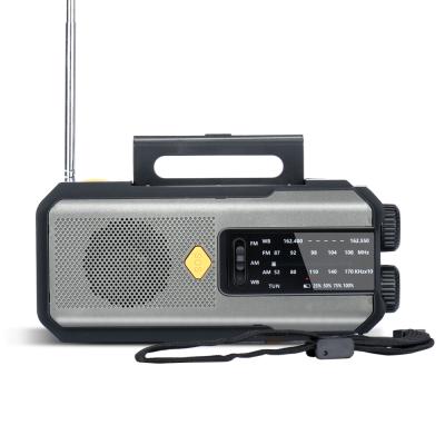 China Outdoor Solar Powered LED Torch Handheld USB Rechargeable  Radio with ABS Plastic Body IP65 Rating for Camping for sale