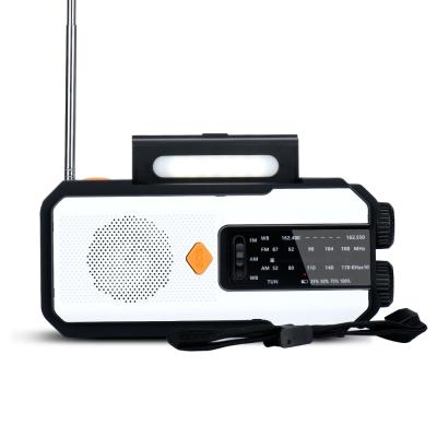 China Portable Solar Emergency Radio with SOS Alarm Autonomous Hand Charging and USB Power Bank Includes FM and AM Band Flashlight for sale
