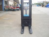 China Solid Tire Electric Stacker Forklift 5000mm Hight Stand On Type forklift stacking truck for sale