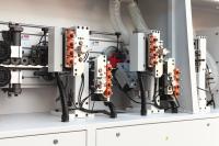 China Linear High Speed EVA Wood Edge Banding Machine Companies 16.54kw 23.3m Min for sale