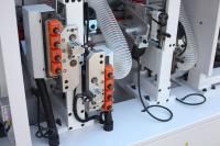 China EVA Bevelled Wood Edge Bander Machine With Two Upside Glue Pot 23.5kw for sale
