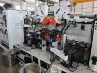 China Panel Furniture Abs Wood Edge Banding Machine Auto Two Glue Pot 13m Min for sale
