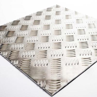China 5052 3003 Aluminum Diamond Plate 0.6-1.2mm Bar Height with ISO9001 Certification for Industrial Flooring and Tool Boxes for sale
