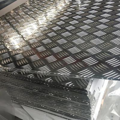 China 3003 5052 Grade Five Bar Aluminum Alloy Tread Plate for Dog Box Fabrication 1.2-7.0mm for sale