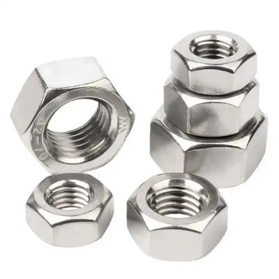 China 0.5-3.0mm Thread Pitch Silver Hex Head Nuts For Fastening On Heavy-Duty Steel Products for sale