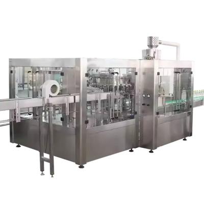 China Rotary Liquid Bottle Filling Machine With 8-14 Nozzles For 0.2-2.5L Containers for sale