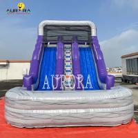China Custom Purple Gray Inflatable Water Slide With Climbing Wall For Adventure Seekers for sale
