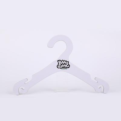 China FSC Paper Baby Hangers Cardboard Material Kids Shirt Hangers With Custom Logo Printing for sale