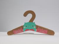 China FSC Certified Recycled Cardboard Pet Clothes Hanger With Silk Printed Logo Nature Color for sale