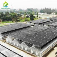China Saw Tooth Multi Span Tropical Weather Plastic Film Greenhouse With Shading System for sale