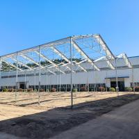 China Commercial Large Tunnel Automated Retractable Roof Plastic Film Vegetable Greenhouse for sale