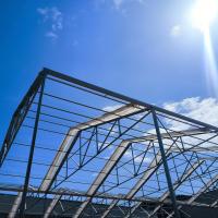 China Commercial Large Tunnel Automated Retractable Roof Plastic Film Vegetable Greenhouse for sale