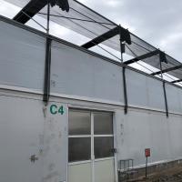 China Black White Film Tropical Poly Tunnel Multi-span Seedling Blackout Greenhouse for sale