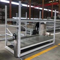 China Double Layers Seedbed Ebb And Flow Greenhouse Rolling Bench Grow Tables for sale