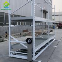China Heavy-Duty Adjustable Rolling Bench for Greenhouses with Hot-dip Galvanized Steel Frame and 120kg/m² Load Capacity for sale