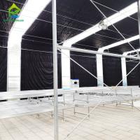 China 9.6m To 12m Span Light Deprivation Greenhouse Gothic Style Black Out Greenhouse for sale