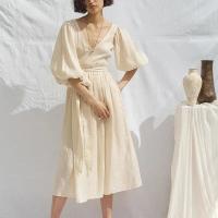 China Puff Sleeve Casual Long Dress Anti Wrinkle V Collar Asymmetric Plain Dyed for sale