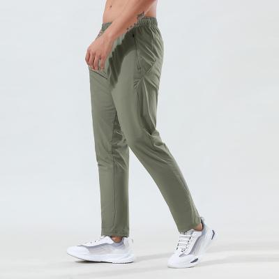 China Sports Quick Dry Pants Men Summer Loose Thin Ice Silk Outdoor Running Fitness Yoga Casual Training Pants for sale