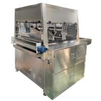 China Double Pumps Pure Chocolate Enrobing Line With Tube Type Exchanger for sale