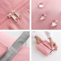 China Durable Waterproof Nylon Foldable Travel Duffel Bag 50L Customizable Colors for sale