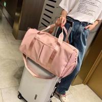 China Custom Nylon Gym Bag 50L Waterproof Anti Theft Sports Luggage for Travel for sale