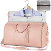 China Foldable Women's Travel Carry On Clothing Bag Large PU Leather Duffel Bag 52cm Waterproof OEM ODM for sale