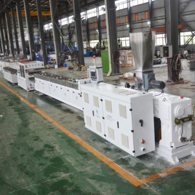 China 50-110mm PVC Pipe Making Machine with 55KW Extruder and 550kg/h Output Capacity for sale