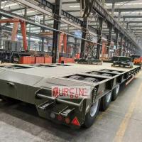 China 3 Axle 80 Ton Low Bed Semi Trailer Low Deck Heavy Duty Chassis For Heavy Machinery Transport for sale