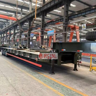 China 3 Axle 80 Ton Low Bed Semi Trailer Low Deck Heavy Duty Chassis For Heavy Machinery Transport for sale