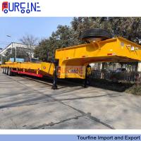 China 4 Axle 120 Ton Low Bed Semi Trailer With Hydraulic Ramp And Reinforced Frame for sale
