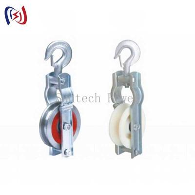 China Heavy Duty Grounding Wire Stringing Block with 5kn-150kn Rate Load and 660x560x100mm Sheaves Size for Grid Construction for sale