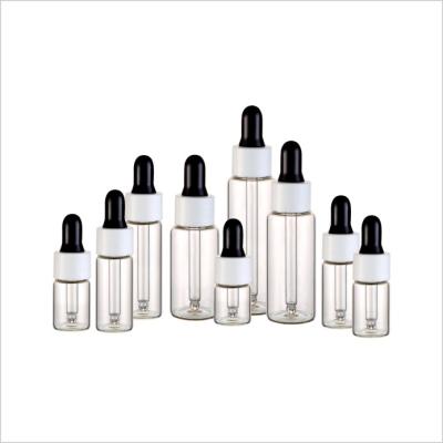 China Transparent Glass Essence Oil Bottle with Plastic Dropper Cap 5ml to 30ml Capacity 22mm Diameter for sale