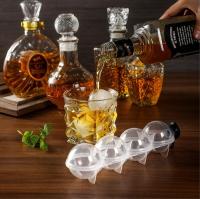 China DIY Silicone Ice Maker Whiskey Ice Hockey Four Hole Mold Round Plastic Ice Ball Mould for sale