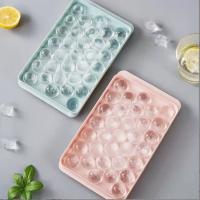 China Round Reusable Ice Cube Maker with Lid Eco-Friendly Food Grade PP Plastic for sale