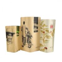 China Custom Kraft Paper Stand Up Pouch with Valve 150 Micron Food Packaging Bags for sale