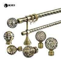 China Antique Brass Color 28/19mm Metal Twist Curtain Pole Set With Ball Design Finials for sale