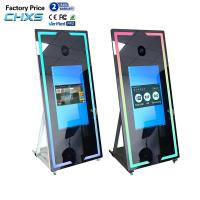China CHXS 32 43 Inch Mirror Photo Booth with Free Printer Accessories Touch Screen Instant Print for sale