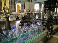 China 0.5L Plastic PET 32000 BPH Bottled Water Filling Machine Rinser Filler Capper Monobloc for sale