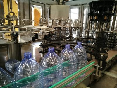 China 0.5L Plastic PET 32000 BPH Bottled Water Filling Machine Rinser Filler Capper Monobloc for sale